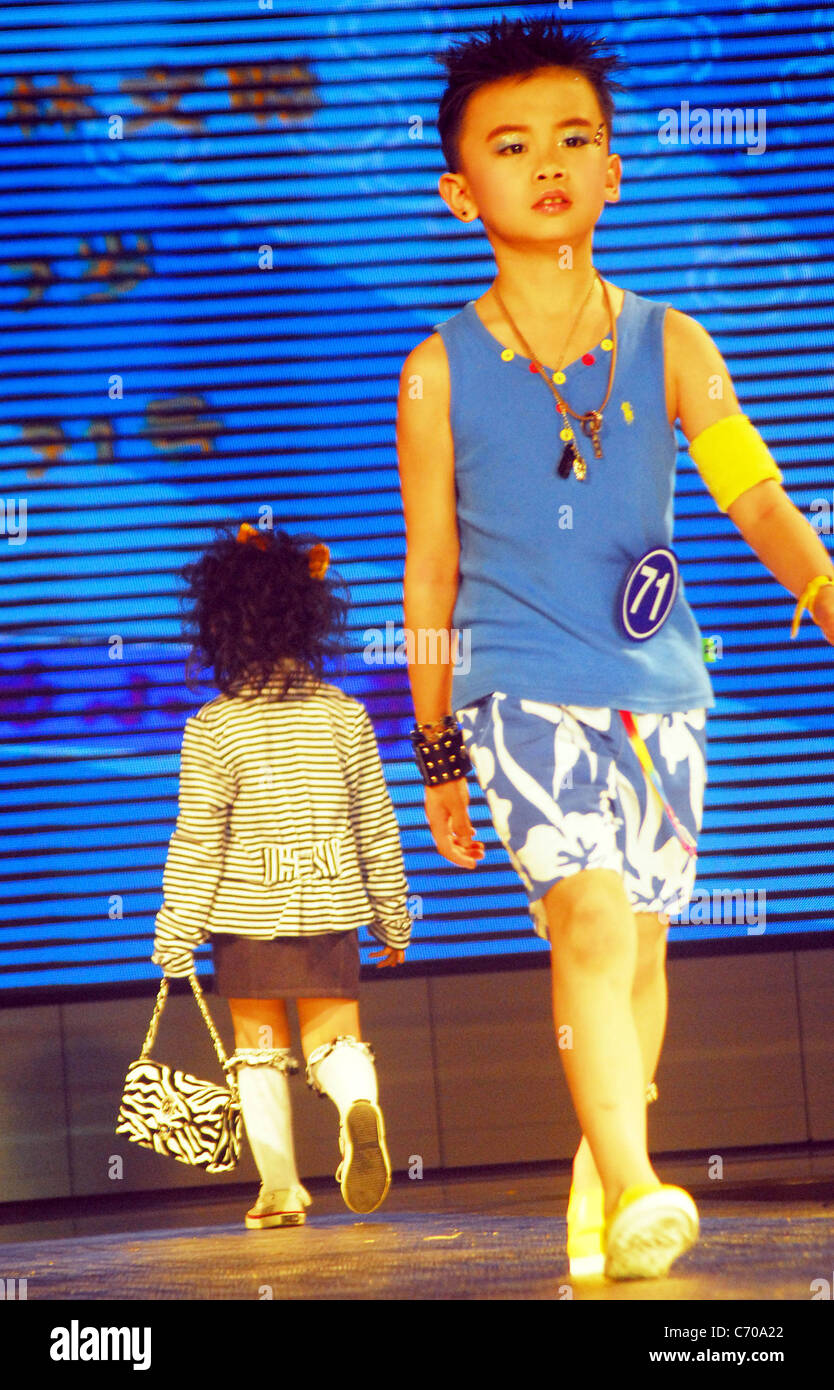 Kid models perform their show during a children model contest in Haikou ...