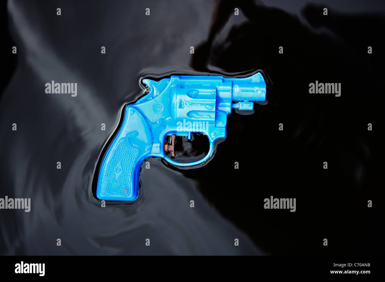 Gun floating hi-res stock photography and images - Alamy
