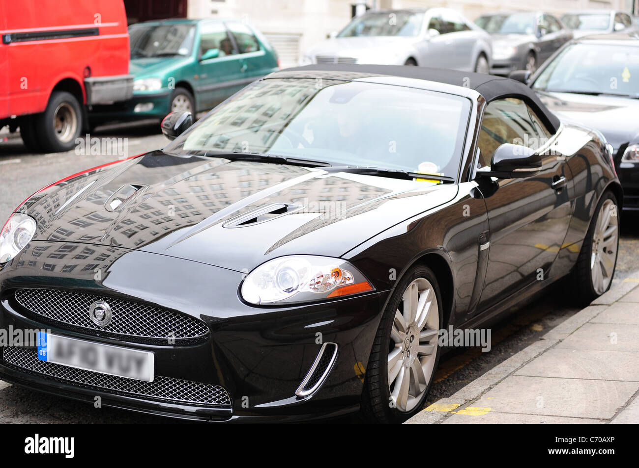 Liverpool footballer's Jaguar Steven Gerrard and Alex Curran return to ...