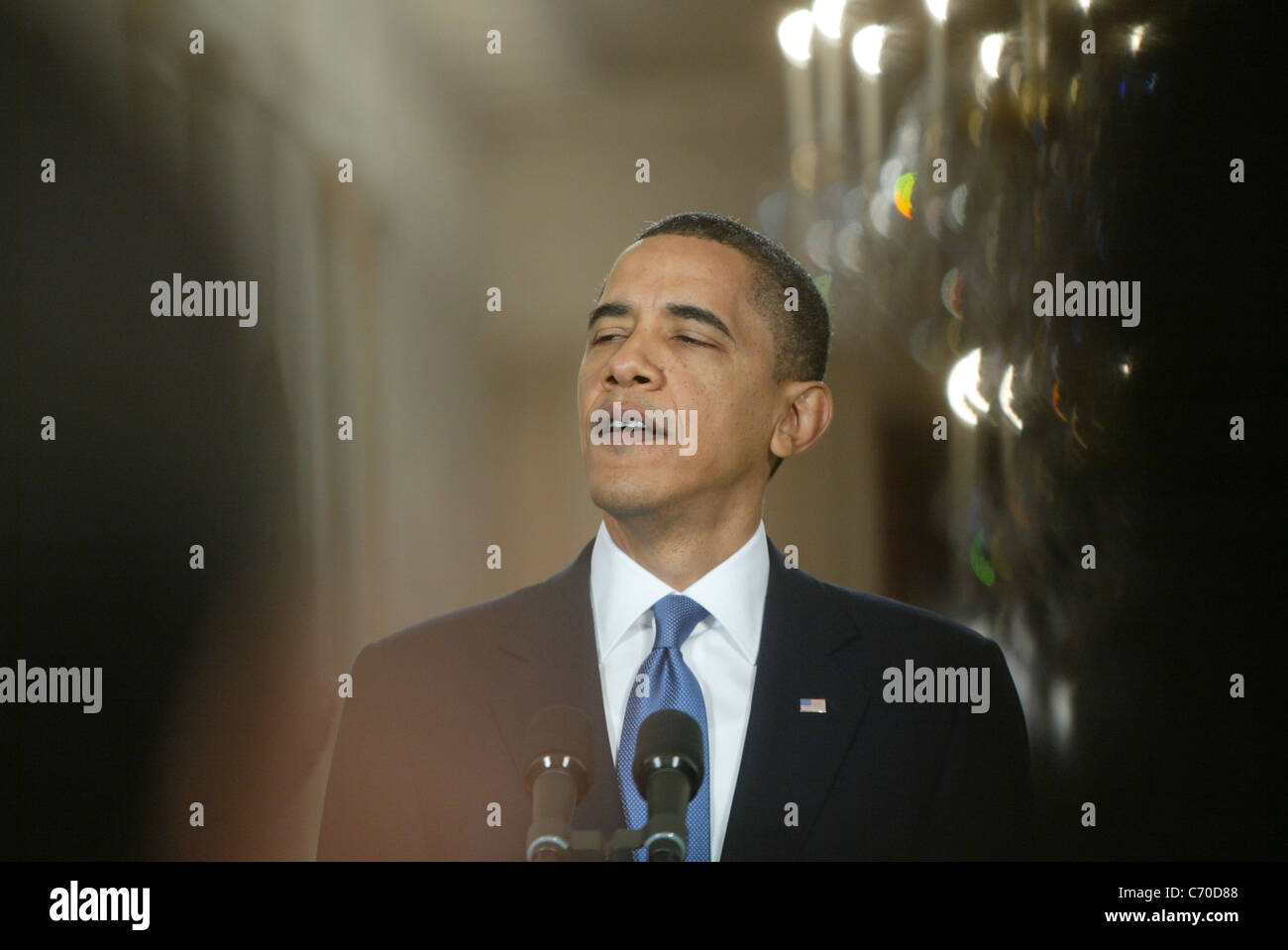 President Barack Obama signs the health insurance reform bill in the ...