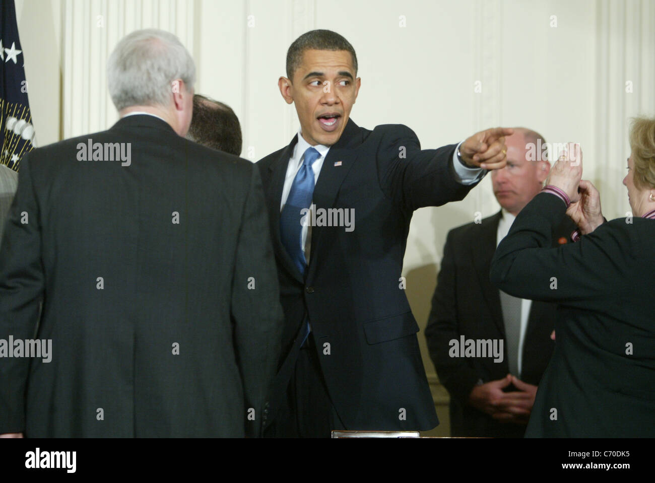 Congressional supporters congratulating President Obama after signing ...