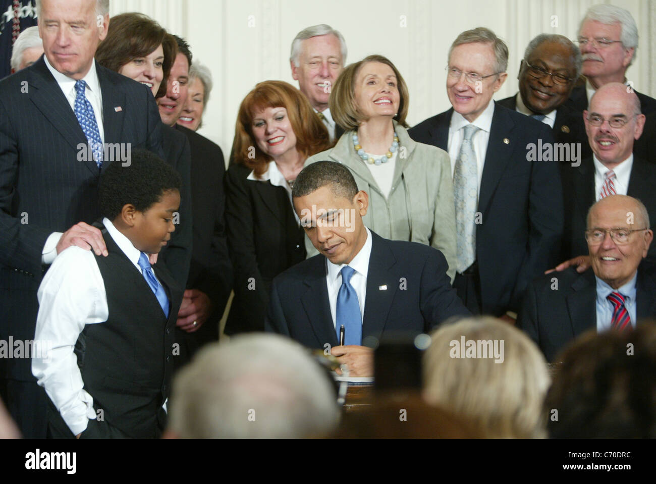 Congressional Supporters Congratulating President Obama after signing ...