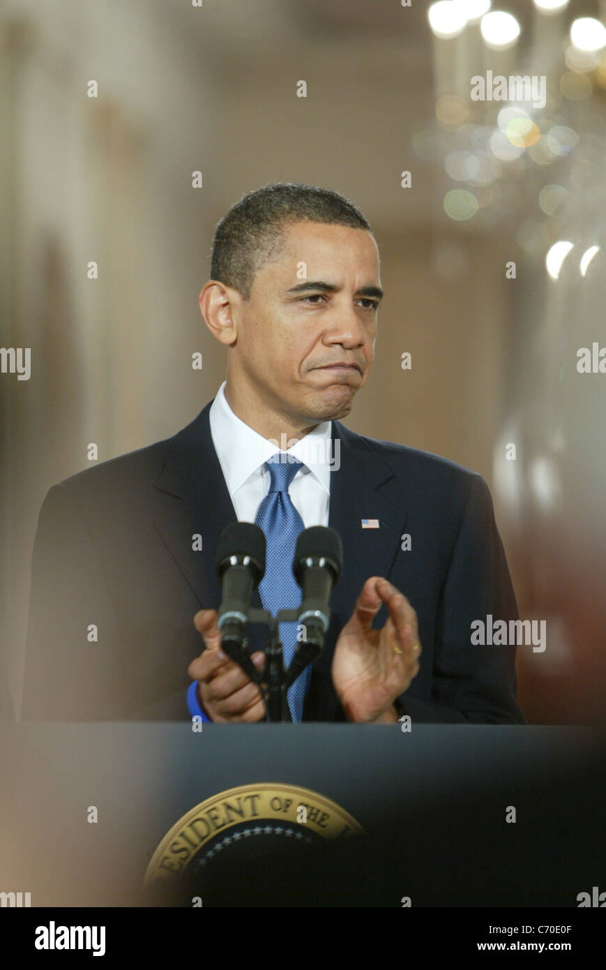 President Barack Obama signs the health insurance reform bill in the ...