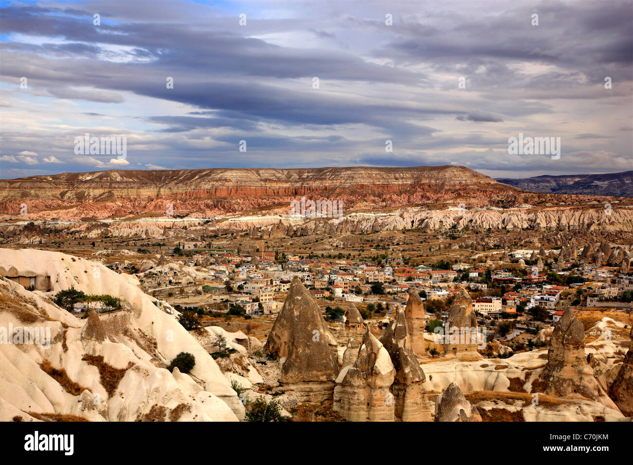 Picturesque Goreme village surrounded by the spectacular landscape of ...
