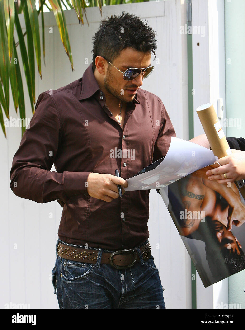 Peter Andre signs autographs as he leaves his house Brighton, England ...
