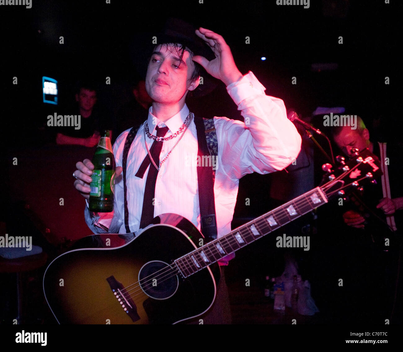 Pete Doherty drinking beer on stage during a sold out intimate gig at ...