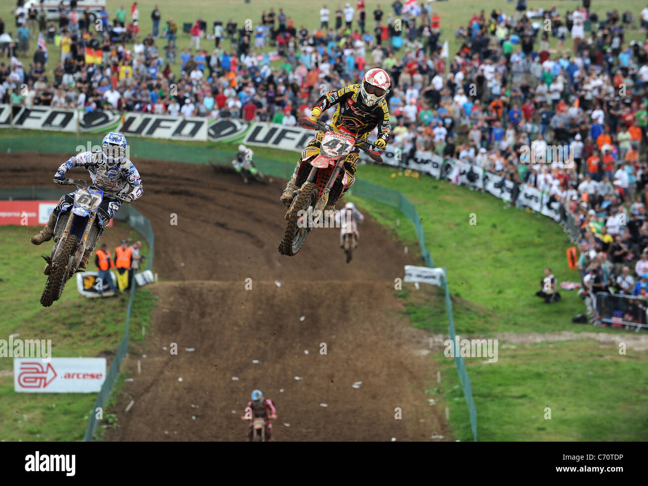 A Motocross Rider jumps through the air on an MX Bike Stock Photo - Alamy