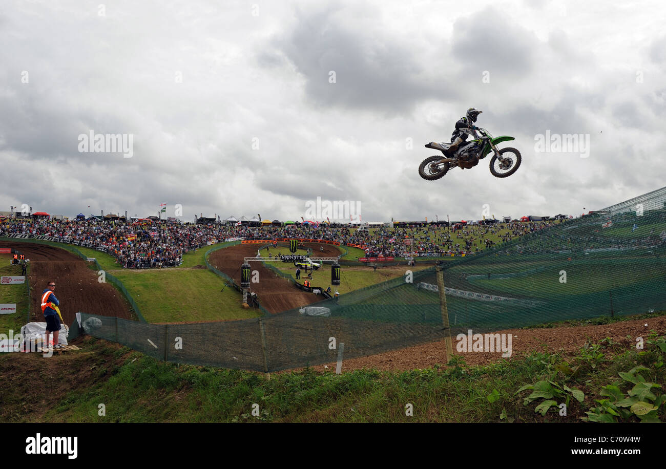Motocross Racers jump through the air on MX Bikes Stock Photo - Alamy