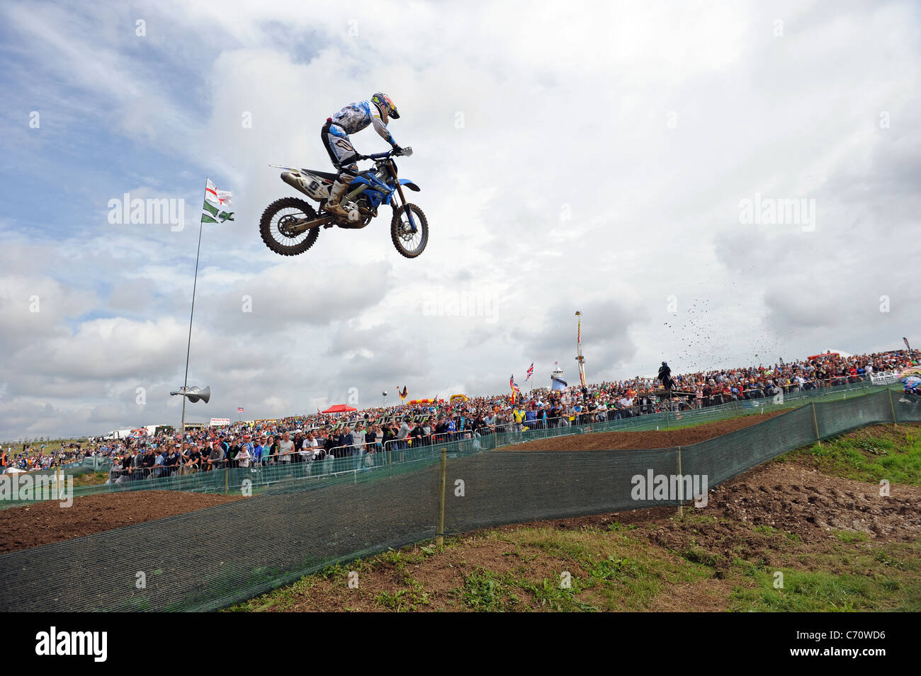 A Motocross Rider jumps through the air on an MX Bike Stock Photo - Alamy