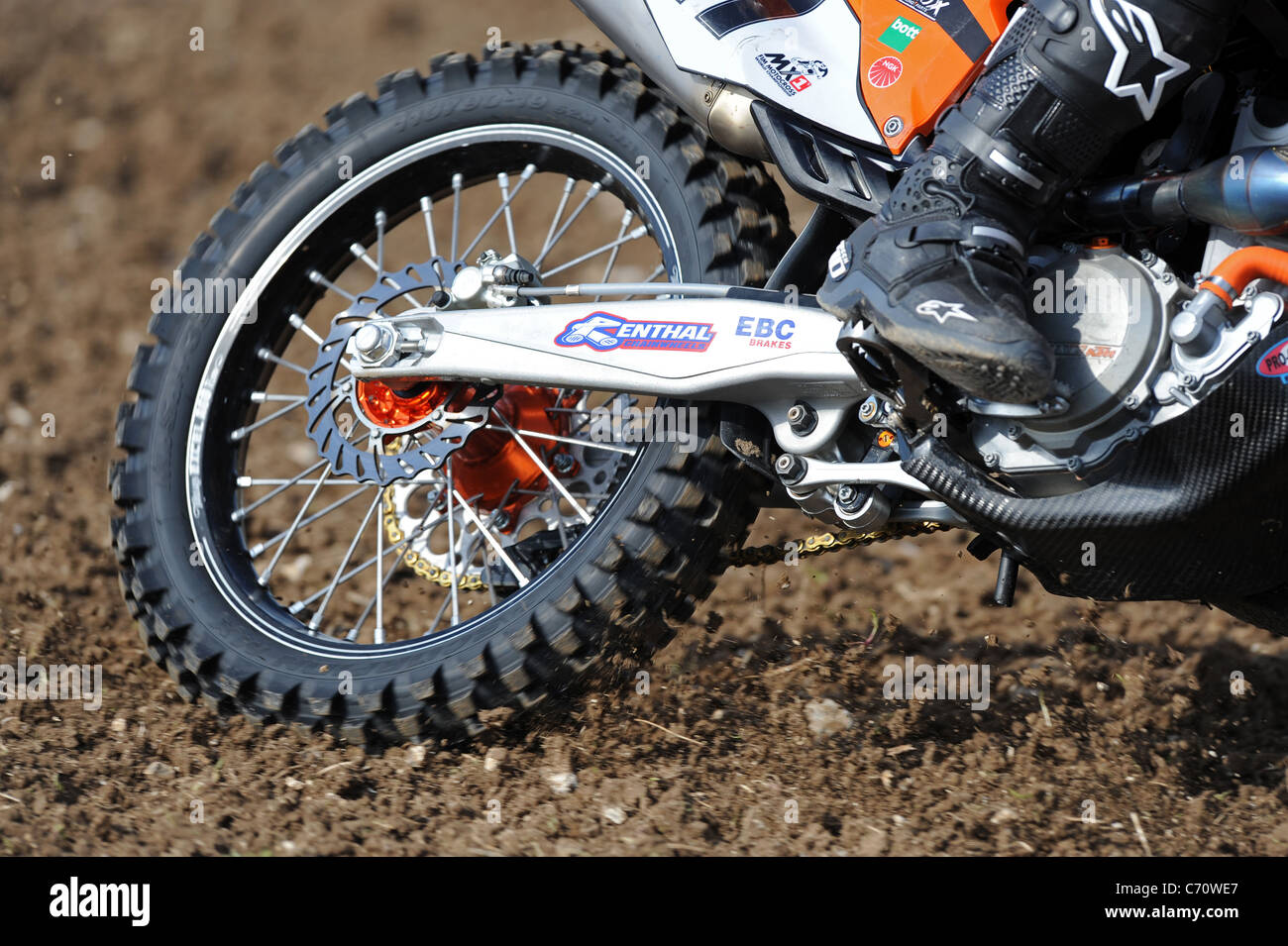 Detail of a Motocross Bike racing on a dirt track Stock Photo - Alamy