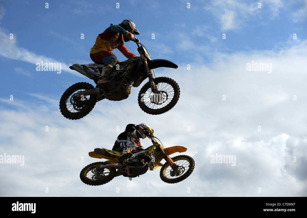 Silhouette motocross racer jumping on hi-res stock photography and ...