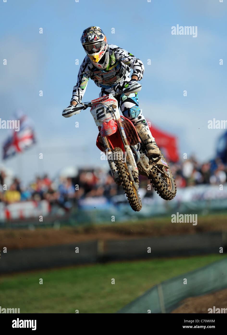 A Motocross Rider jumps through the air on an MX Bike Stock Photo - Alamy