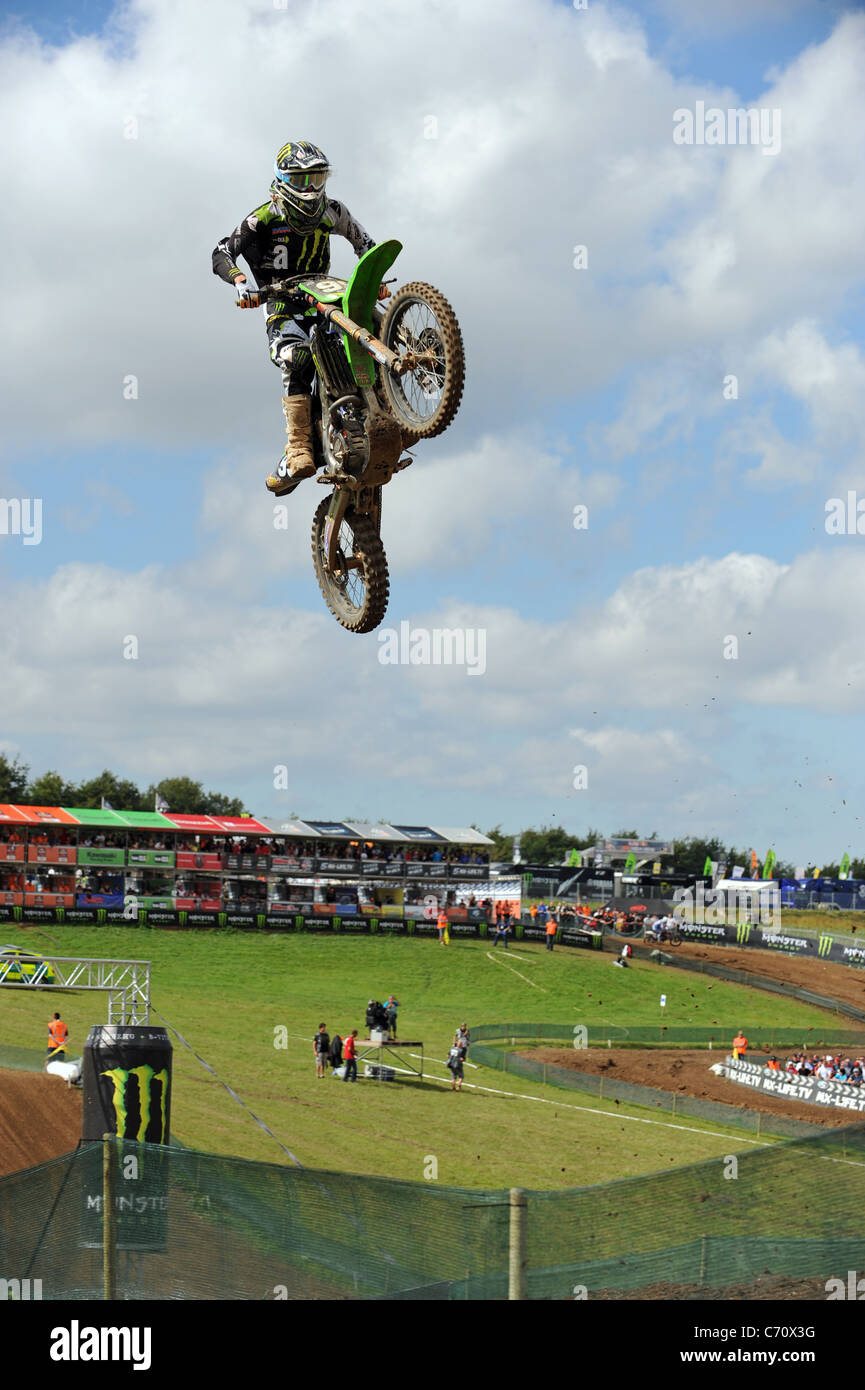 A Motocross Rider jumps through the air on an MX Bike Stock Photo - Alamy
