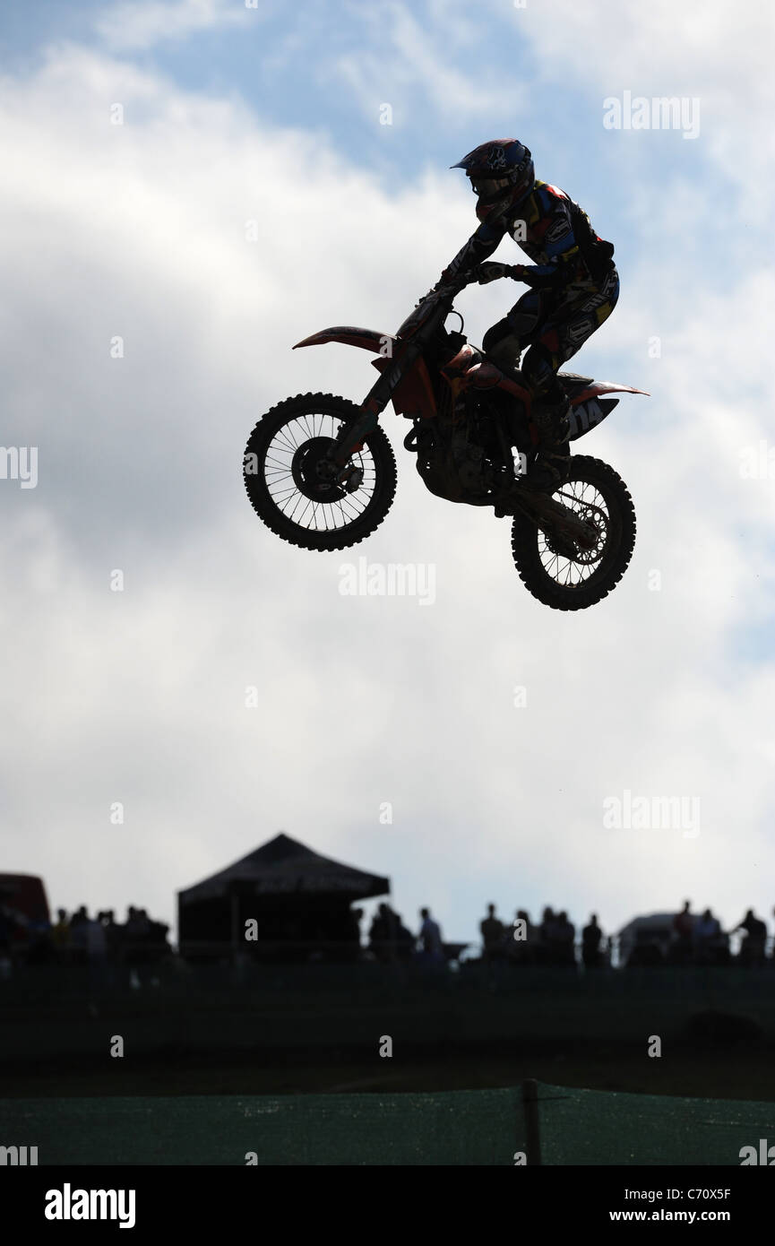 Silhouette of a Motocross Racer jumping on an MX Bike Stock Photo - Alamy
