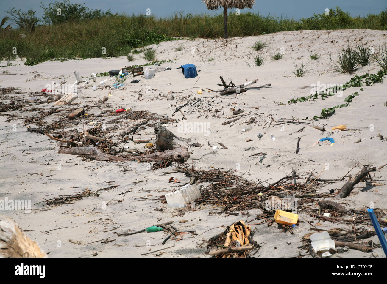 Beach, sand and other things. Polluted beach Stock Photo - Alamy