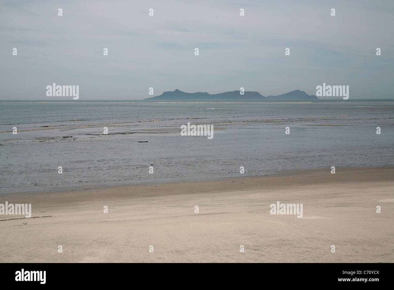 Empty beach during a bright sunny summer day with blue skies Stock ...