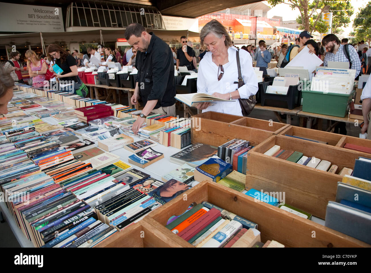 Woman Browsing Books at the Book Market, Waterloo Bridge, South Bank ...