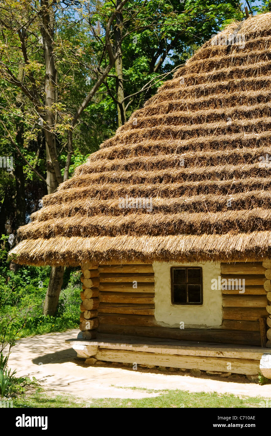 Corner of ancient peasant house with a thatch roof Stock Photo - Alamy