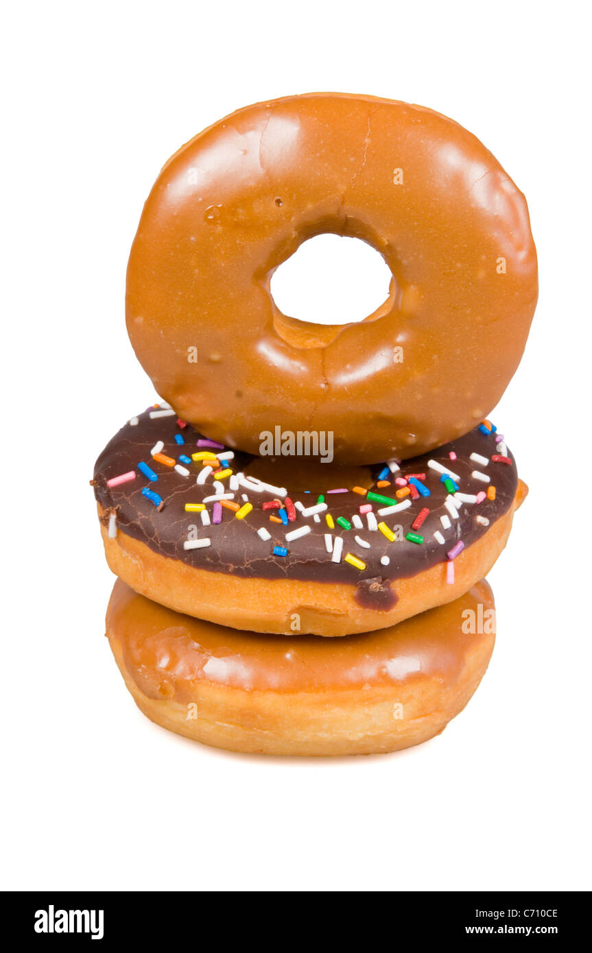 Three colorful sweet doughnuts on white background Stock Photo - Alamy