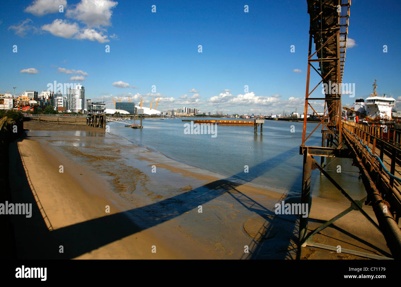 View up the River Thames at Angerstein Wharf towards the O2 Arena ...