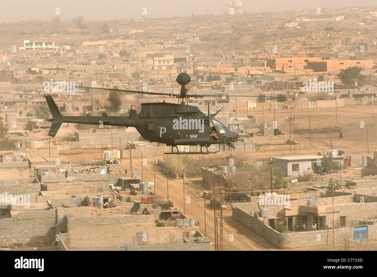 A U.S. Army OH-58D Kiowa helicopter from the 3rd Armored Cavalry ...
