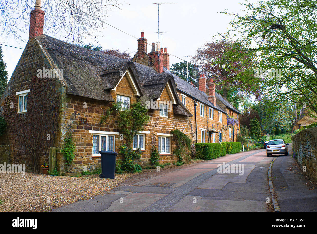 Old ironstone cottages in village of Church Brampton Northamptonshire ...