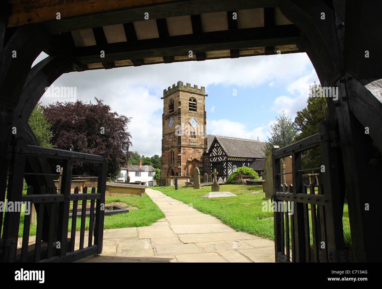 Looking through the Lych Gate towards St Oswald's Church, Lower Peover ...