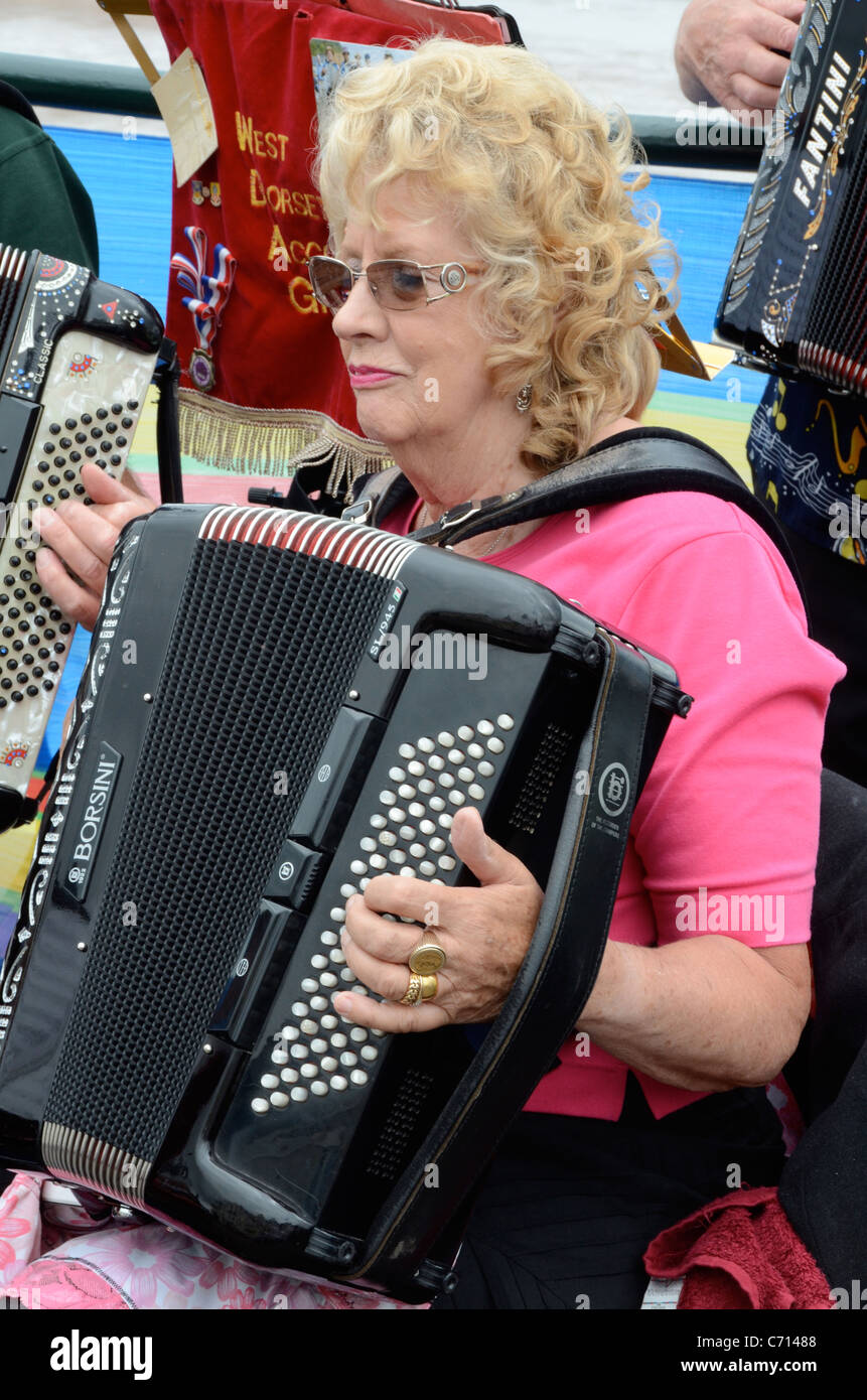 Lady playing the accordion hi-res stock photography and images - Alamy