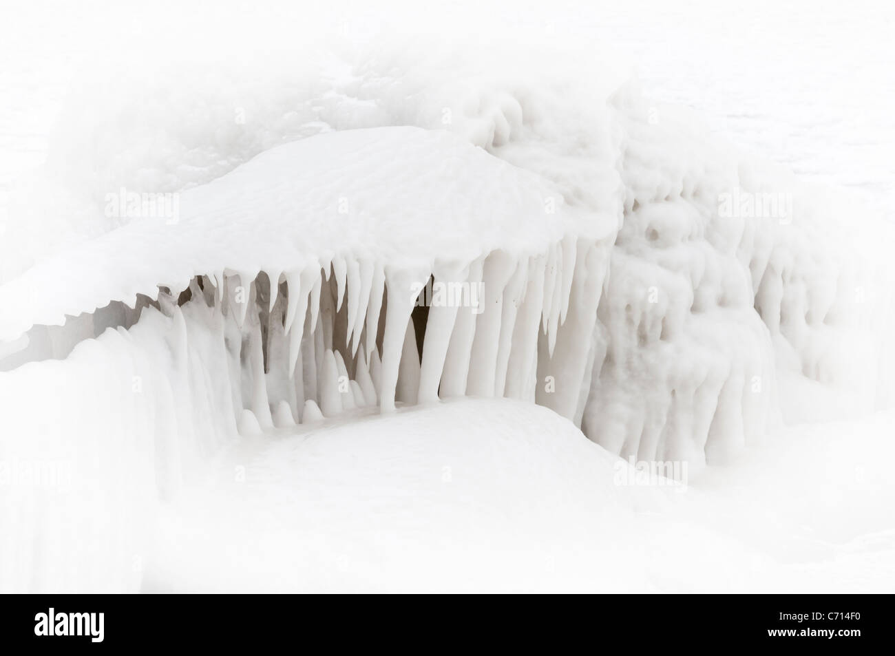 Ice forms around a breakwater on the shores of Lake Erie, Ontario Stock ...