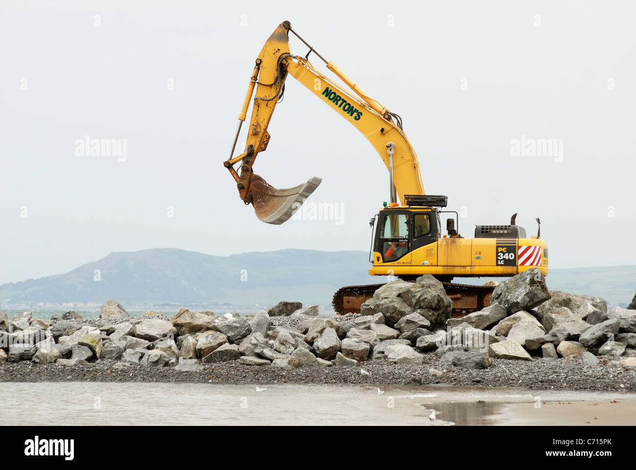 The construction of an artificial reef, part of sea defences for the ...