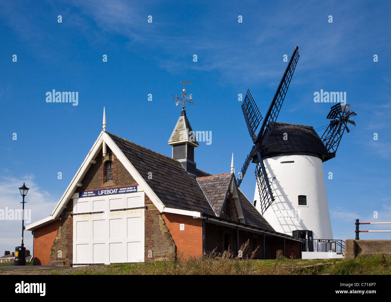 Lytham windmill and old lifeboat station Stock Photo - Alamy