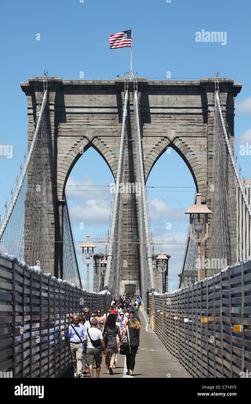 Crowded pedestrian crossing of Brooklyn Bridge, New York Stock Photo ...