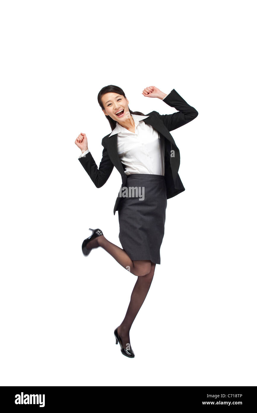 Asian business people jumping hi-res stock photography and images - Alamy