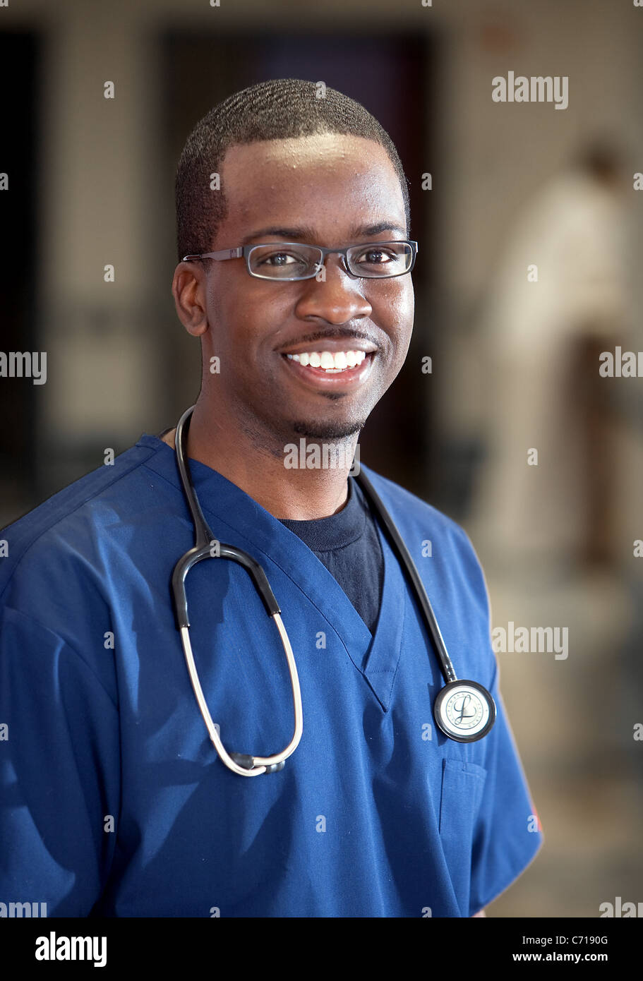 Nurse poses in the hallway of a hospital Stock Photo - Alamy