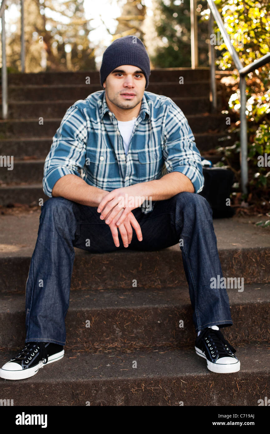 Portrait of a man on steps Stock Photo - Alamy
