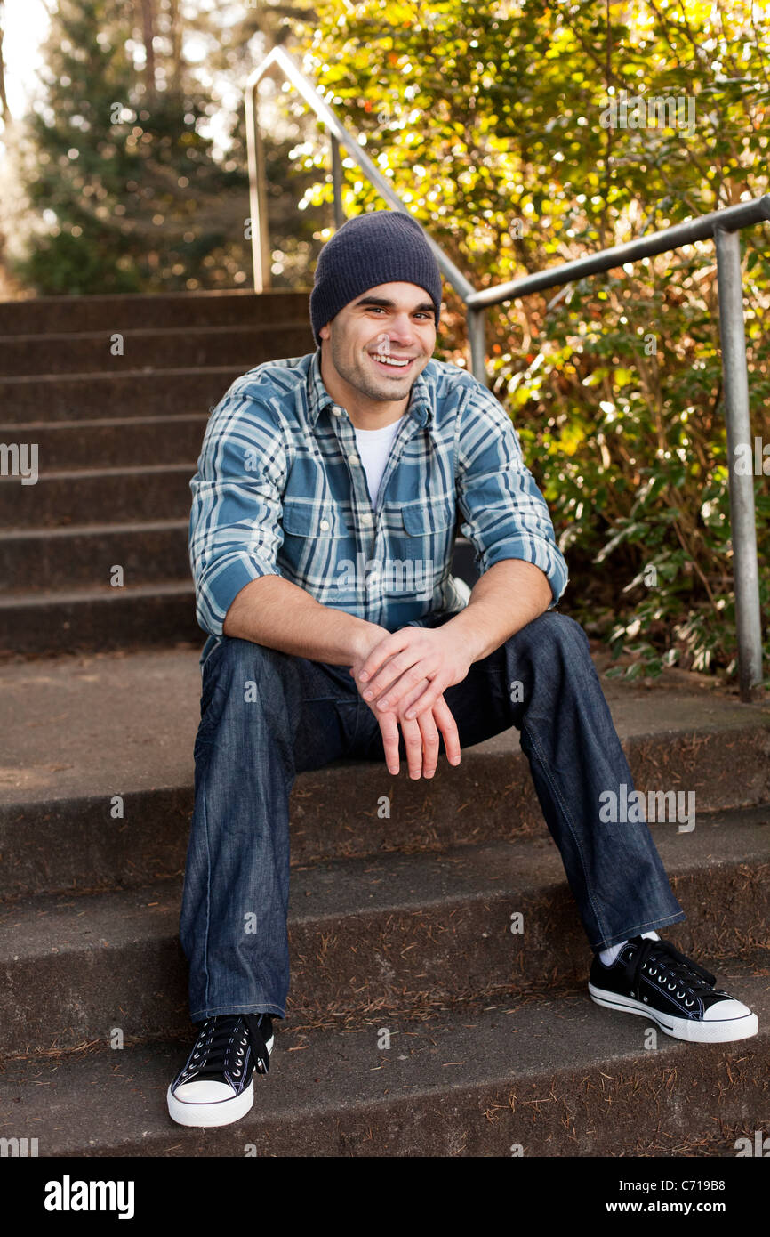 Portrait of a man on steps Stock Photo - Alamy