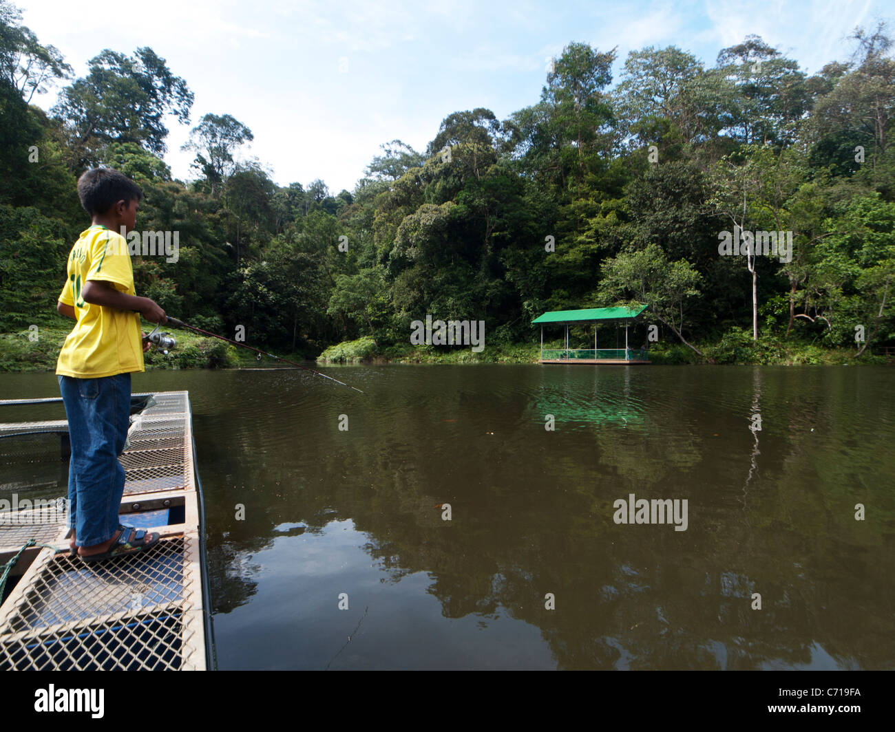 Kid fishing asia hi-res stock photography and images - Alamy