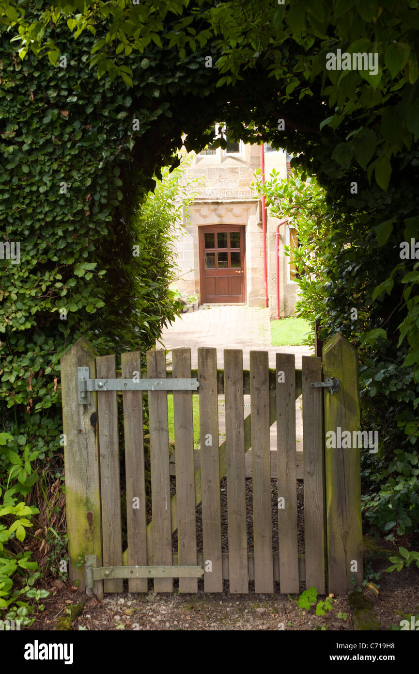 Garden gate, and path leading to house Stock Photo - Alamy