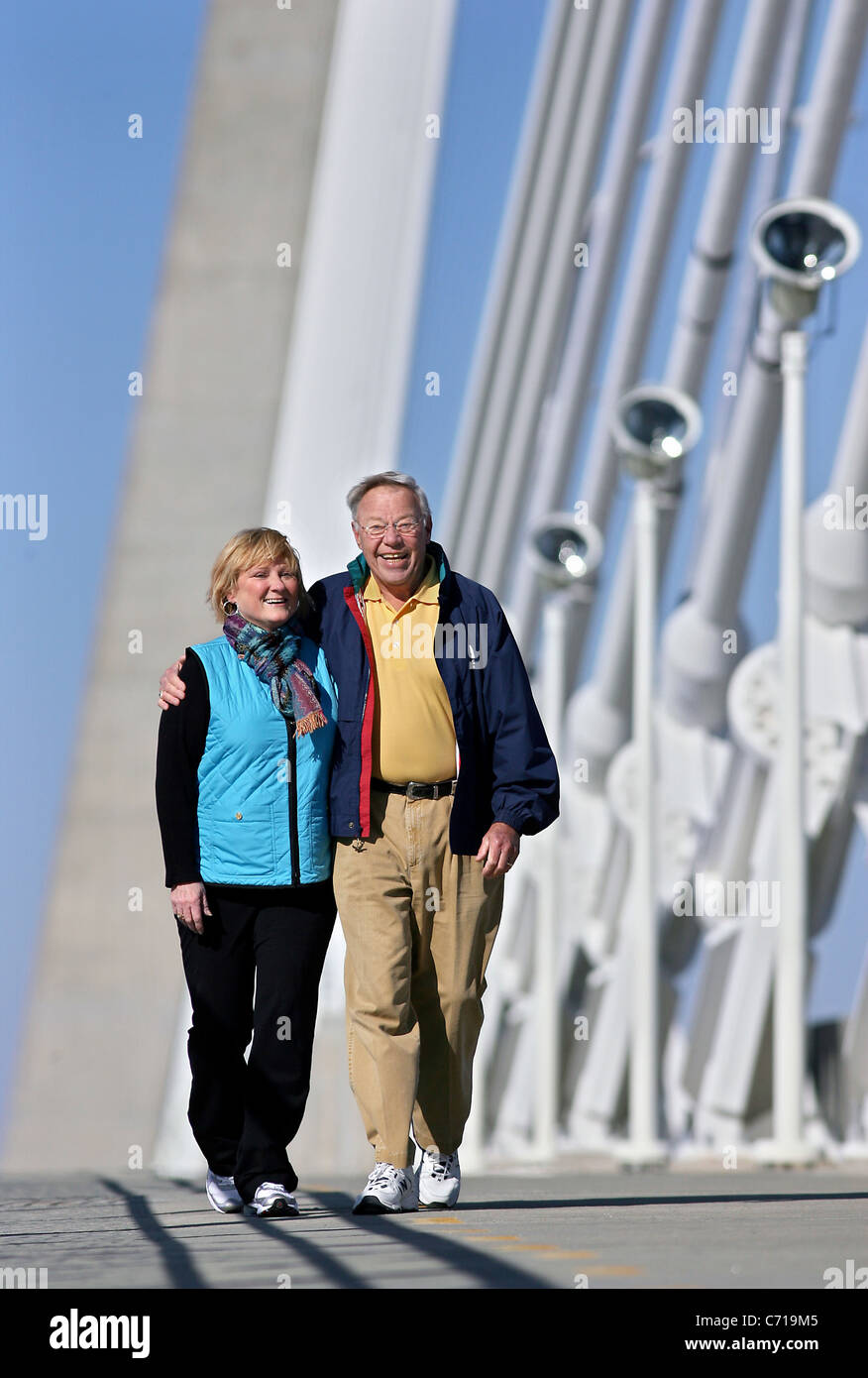 A husband and wife walk over the Ravenel Bridge in Charleston, South ...