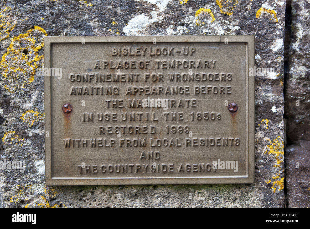 Sign on The Old Village Lock Up or Gaol Bisley Stock Photo - Alamy
