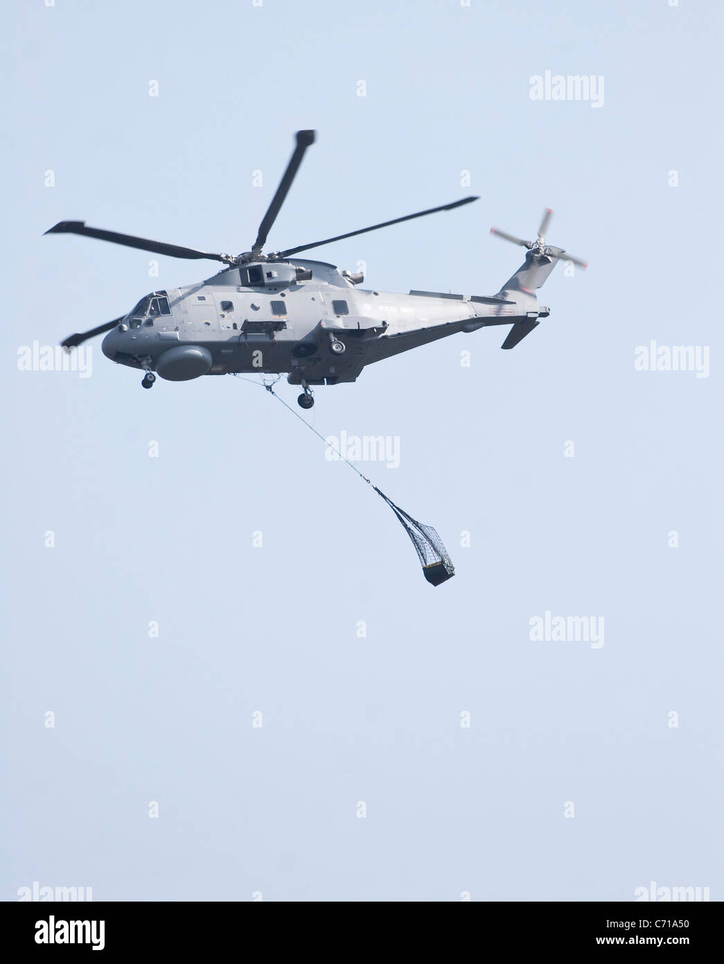 Merlin Helicopter Lifting Cargo Stock Photo - Alamy
