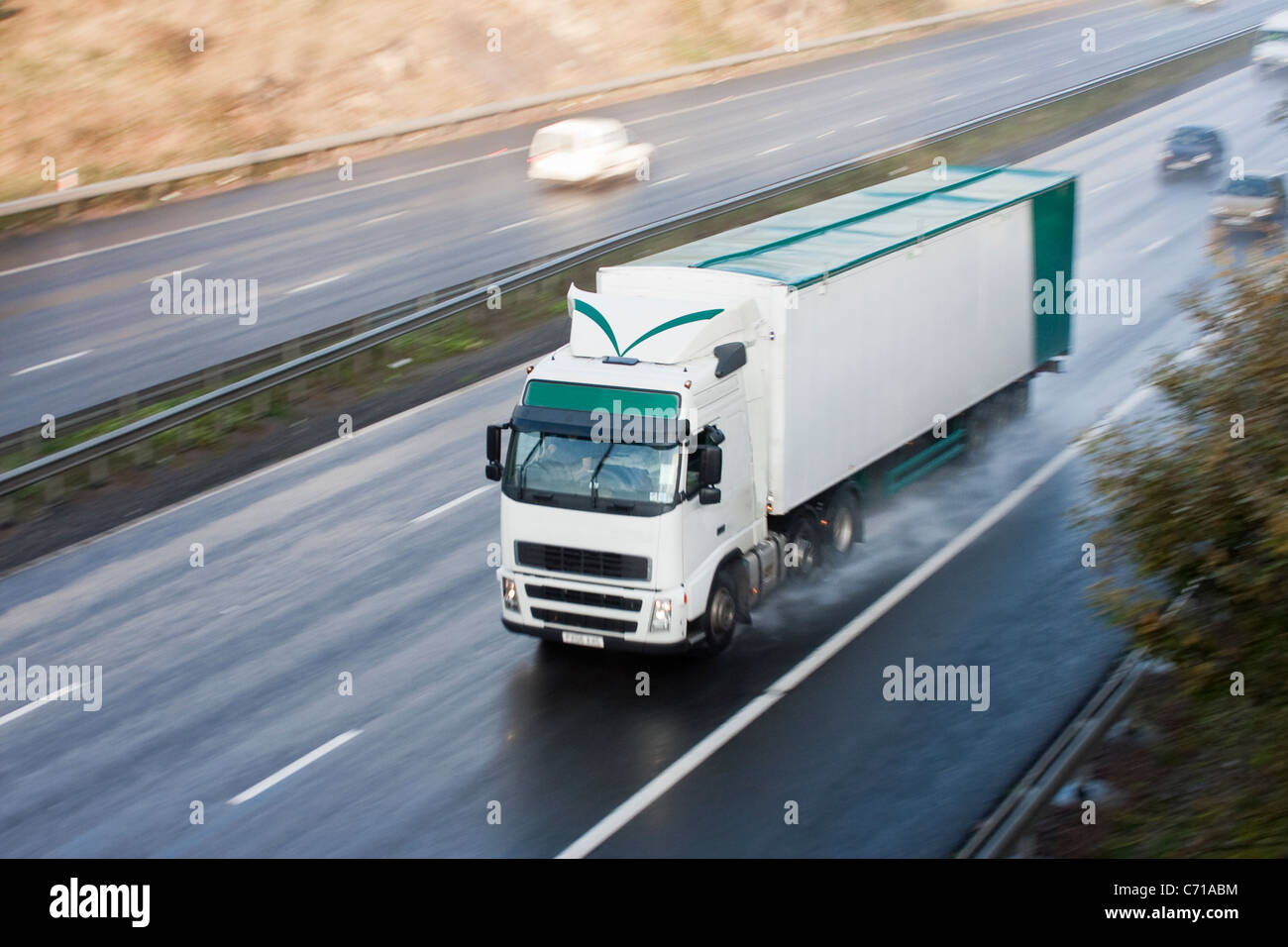 Truck on Motorway Blurred Motion Stock Photo - Alamy