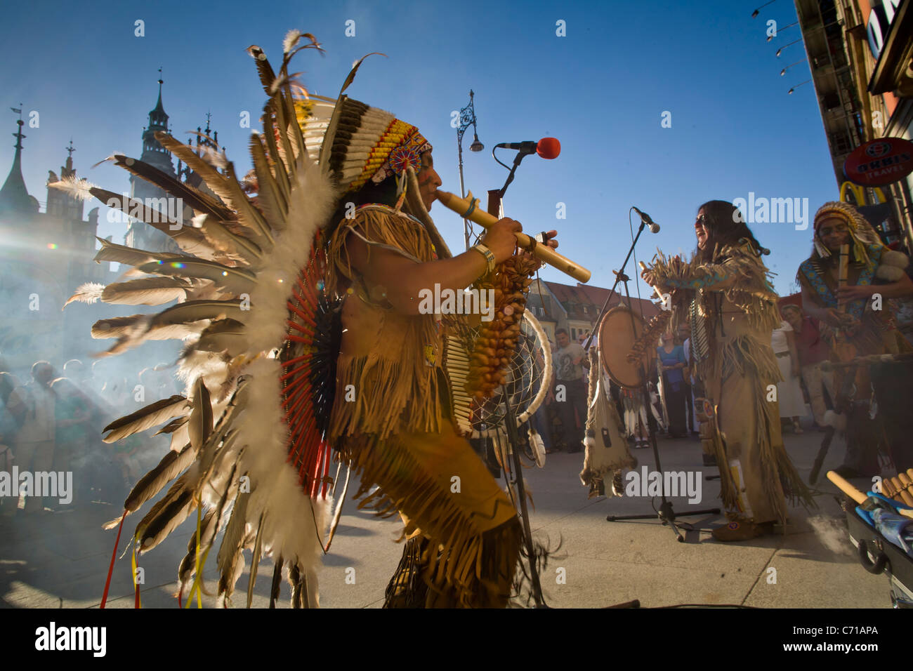 Dancing native American Indian on the market square in front of theTown ...