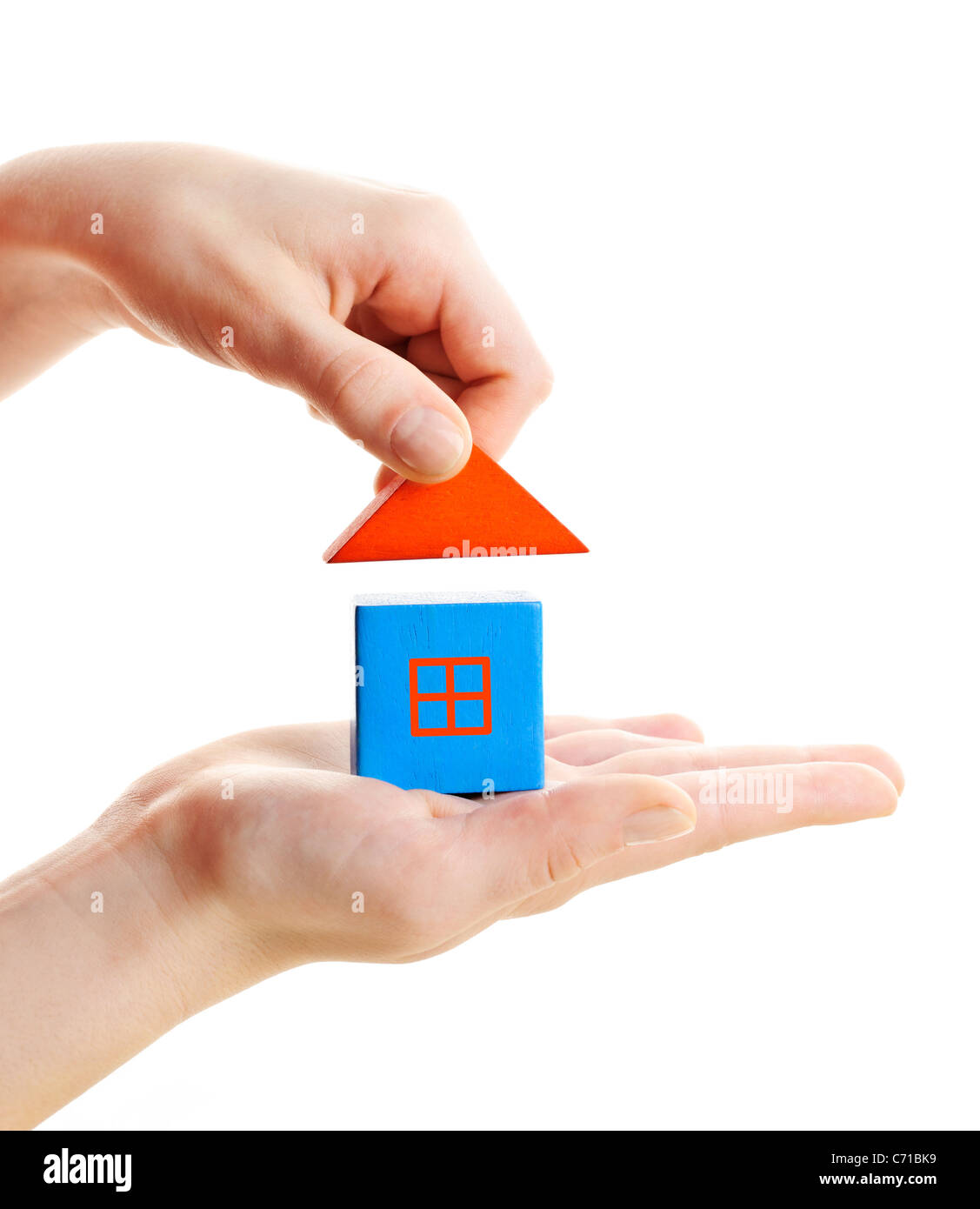Hand building wooden block toy house isolated on white background Stock ...