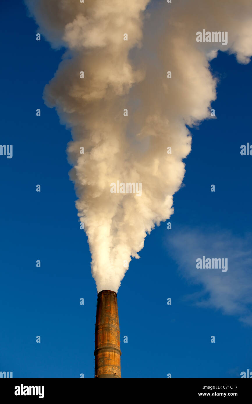 Pipe at mill with lots of smoke Stock Photo - Alamy