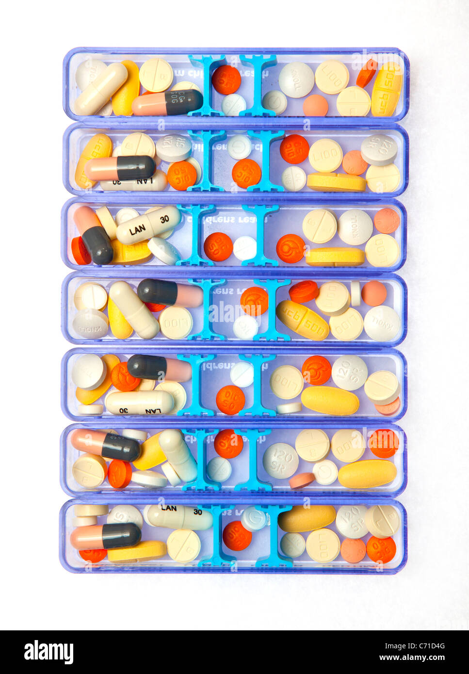 Medication tablets in a seven day organiser Stock Photo - Alamy
