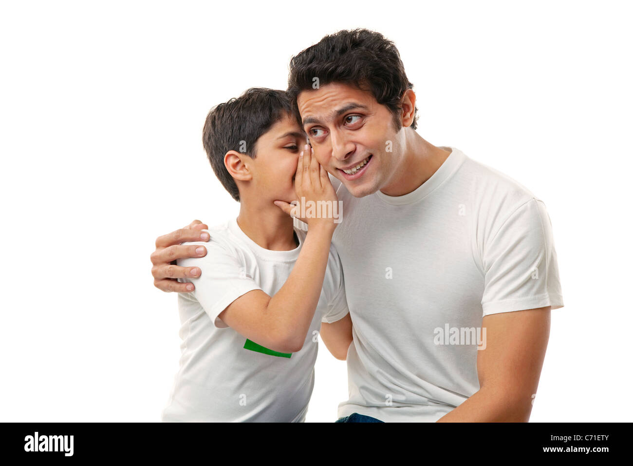 Two boys whispering Cut Out Stock Images & Pictures - Alamy