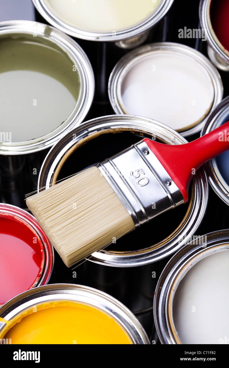 Paint buckets, paint and brush Stock Photo - Alamy