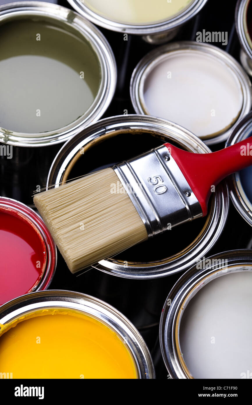 Paint buckets, paint and brush Stock Photo - Alamy