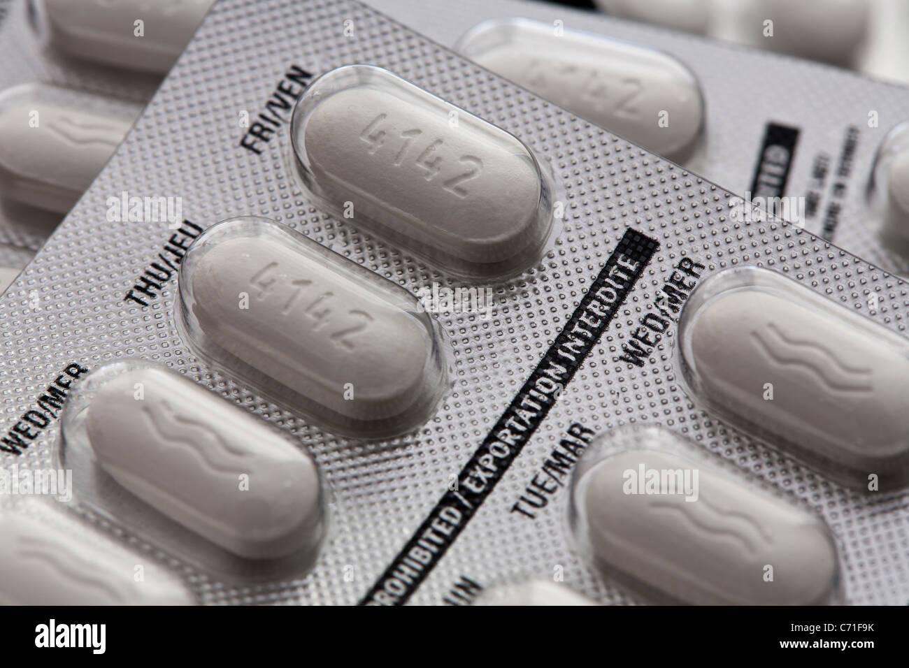 Blister packs of Multaq tablets. Close up of multaq tablets in their ...